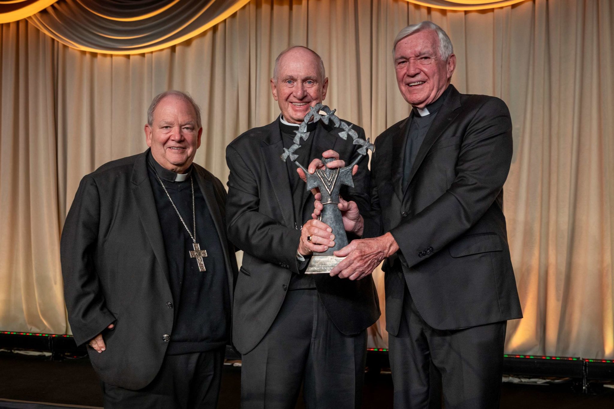 Hundreds gather to honor Bishop Richard Pates, beloved hometown ...